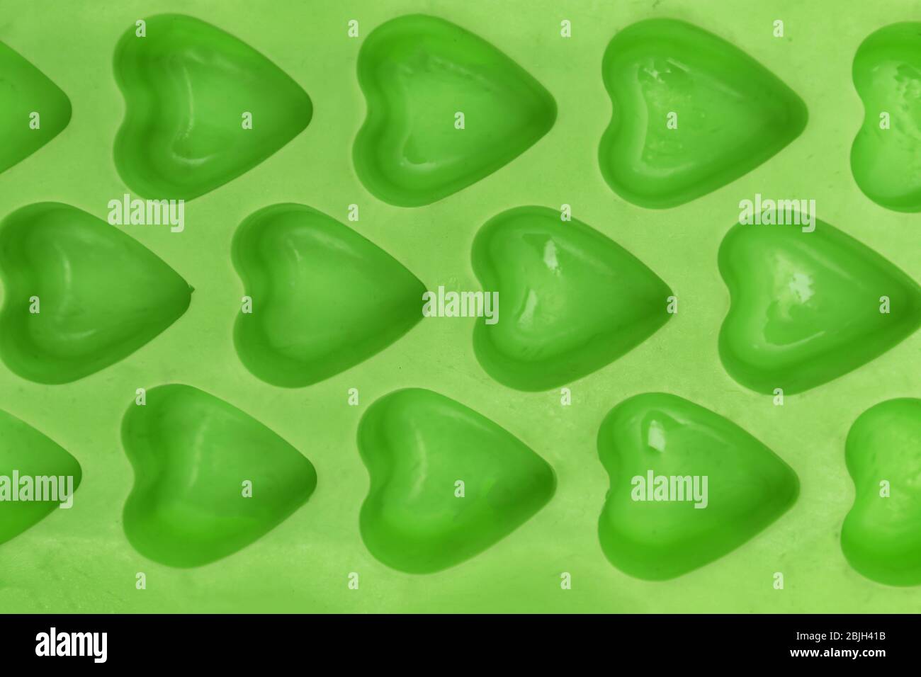 Closeup view of green ice mold Stock Photo - Alamy