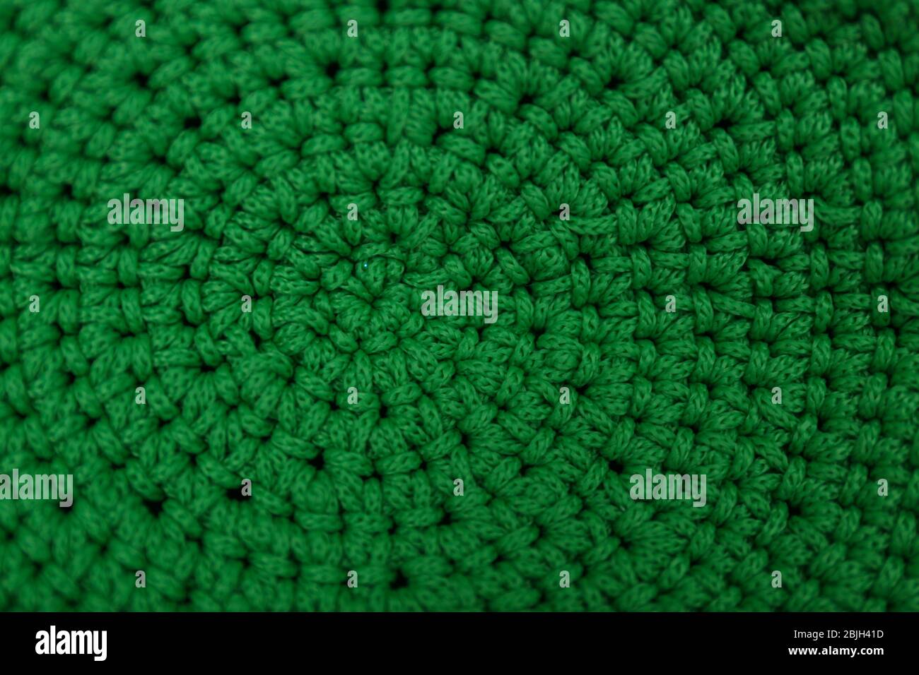 Green knitted sample as background, closeup Stock Photo - Alamy
