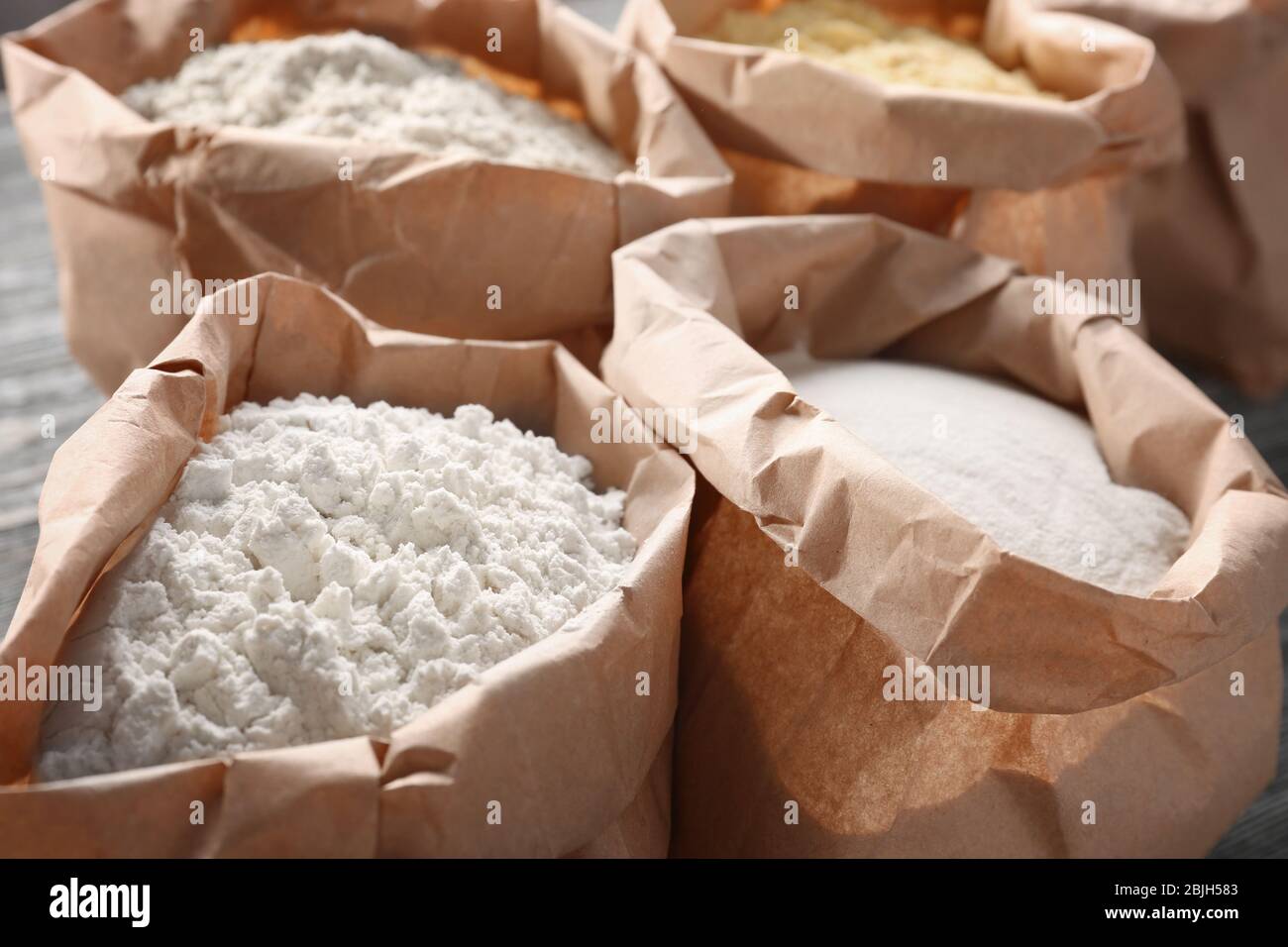 Paper bags with different types of flour, closeup Stock Photo - Alamy