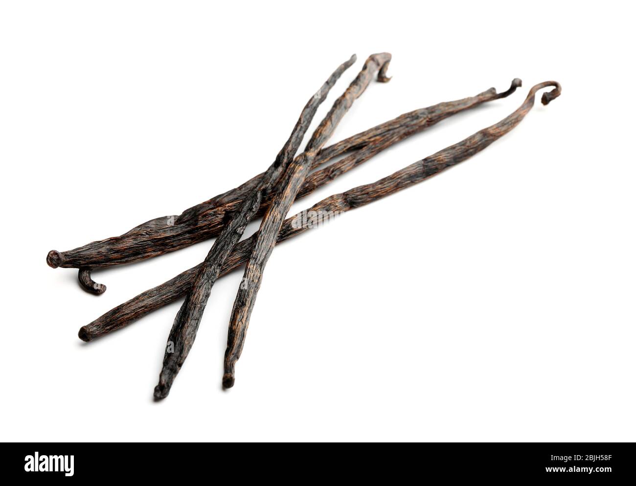 Vanilla pods on white background Stock Photo - Alamy