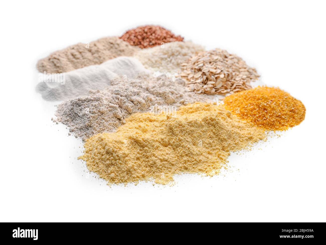 Different types of flour on white background Stock Photo - Alamy