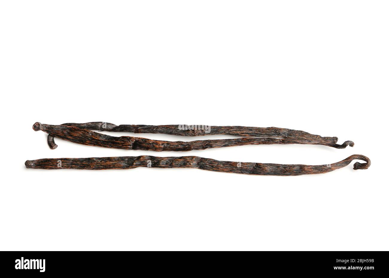 Vanilla pods on white background Stock Photo - Alamy
