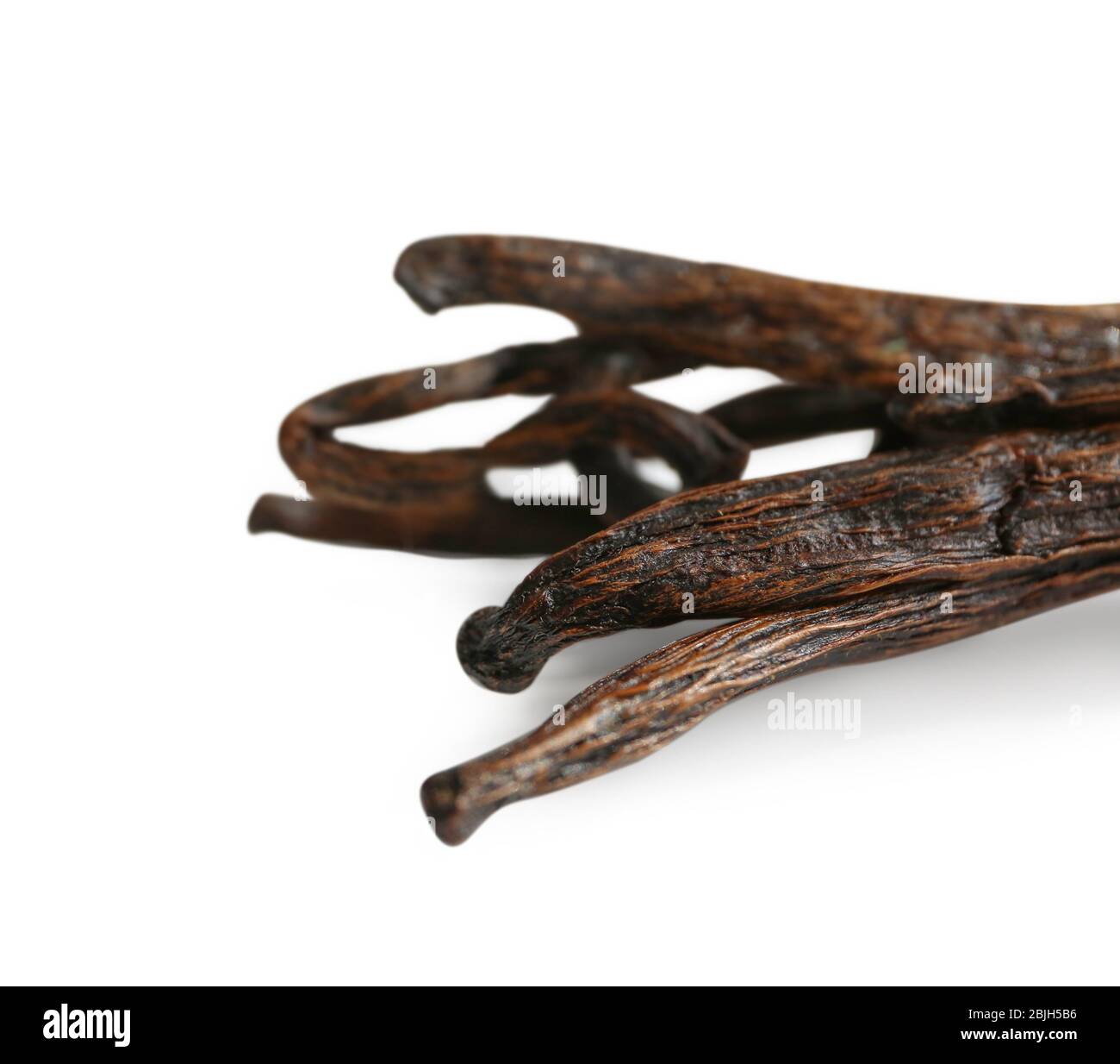 Vanilla pods on white background Stock Photo - Alamy