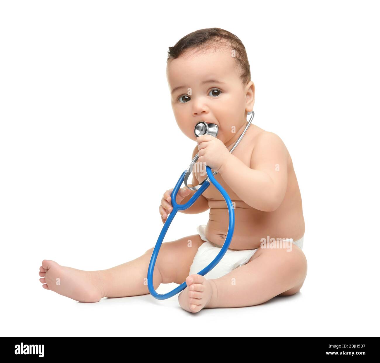 Cute little baby with stethoscope on white background. Health care ...