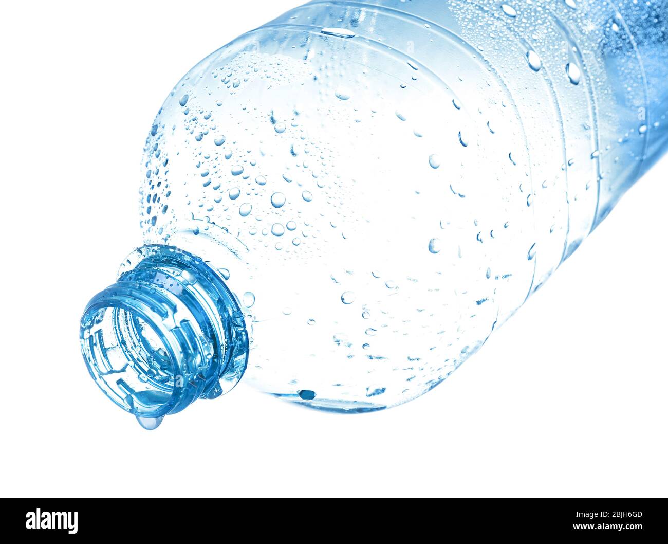 Empty plastic bottle with drops of water on white background Stock ...