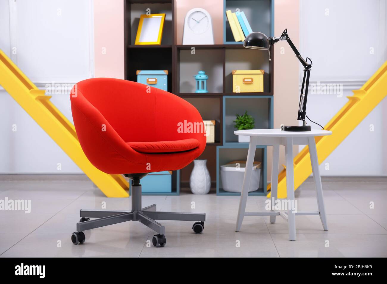 Beautiful interior of modern room with cozy chair Stock Photo - Alamy