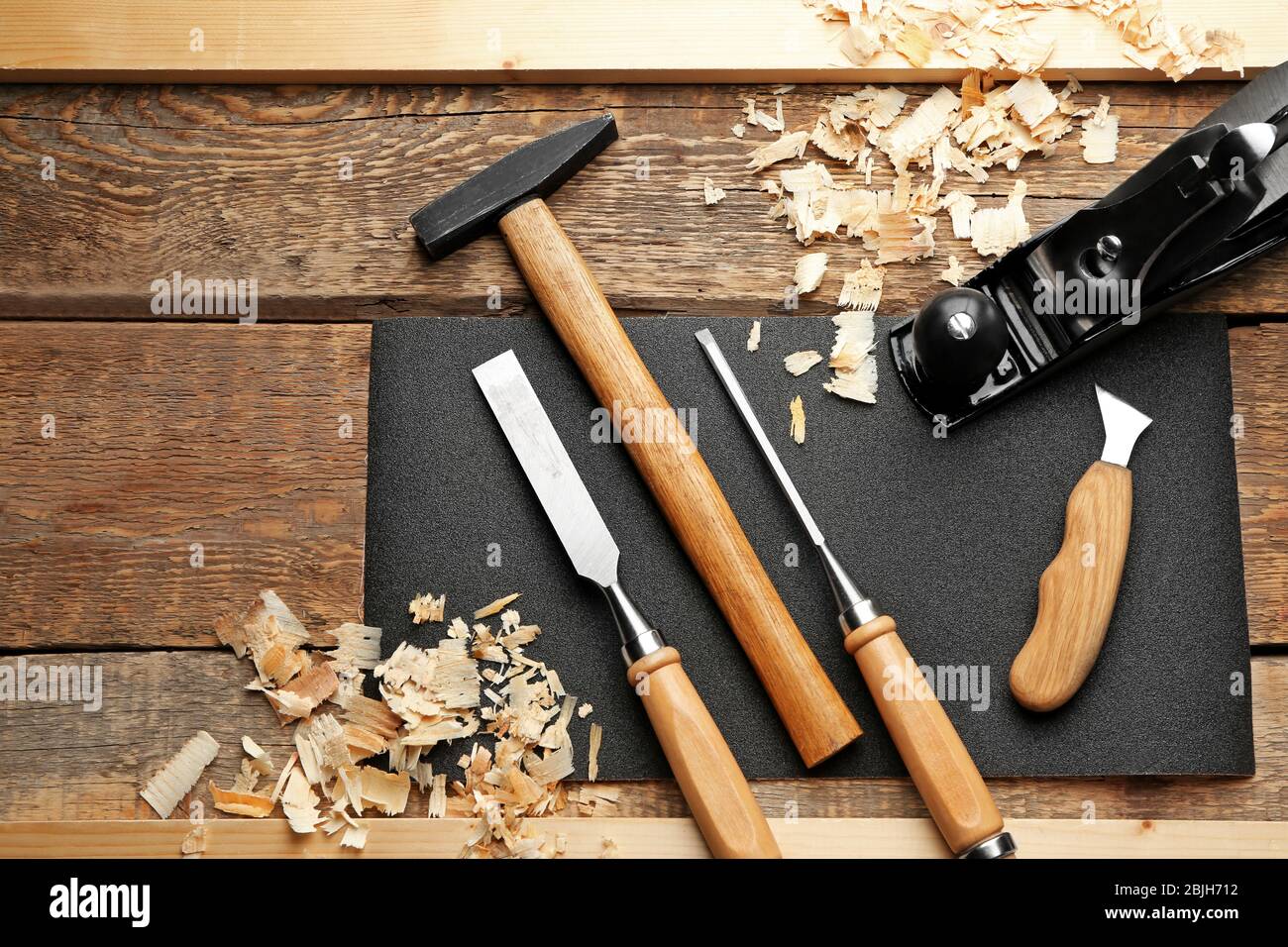 Set of carpenter's tools on wooden background Stock Photo - Alamy