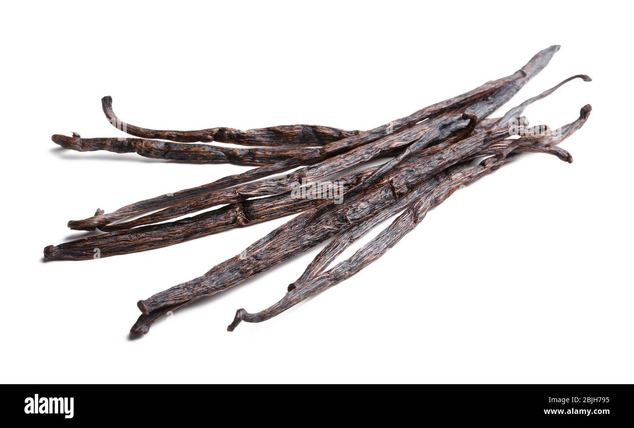 Dried vanilla sticks on white background Stock Photo - Alamy