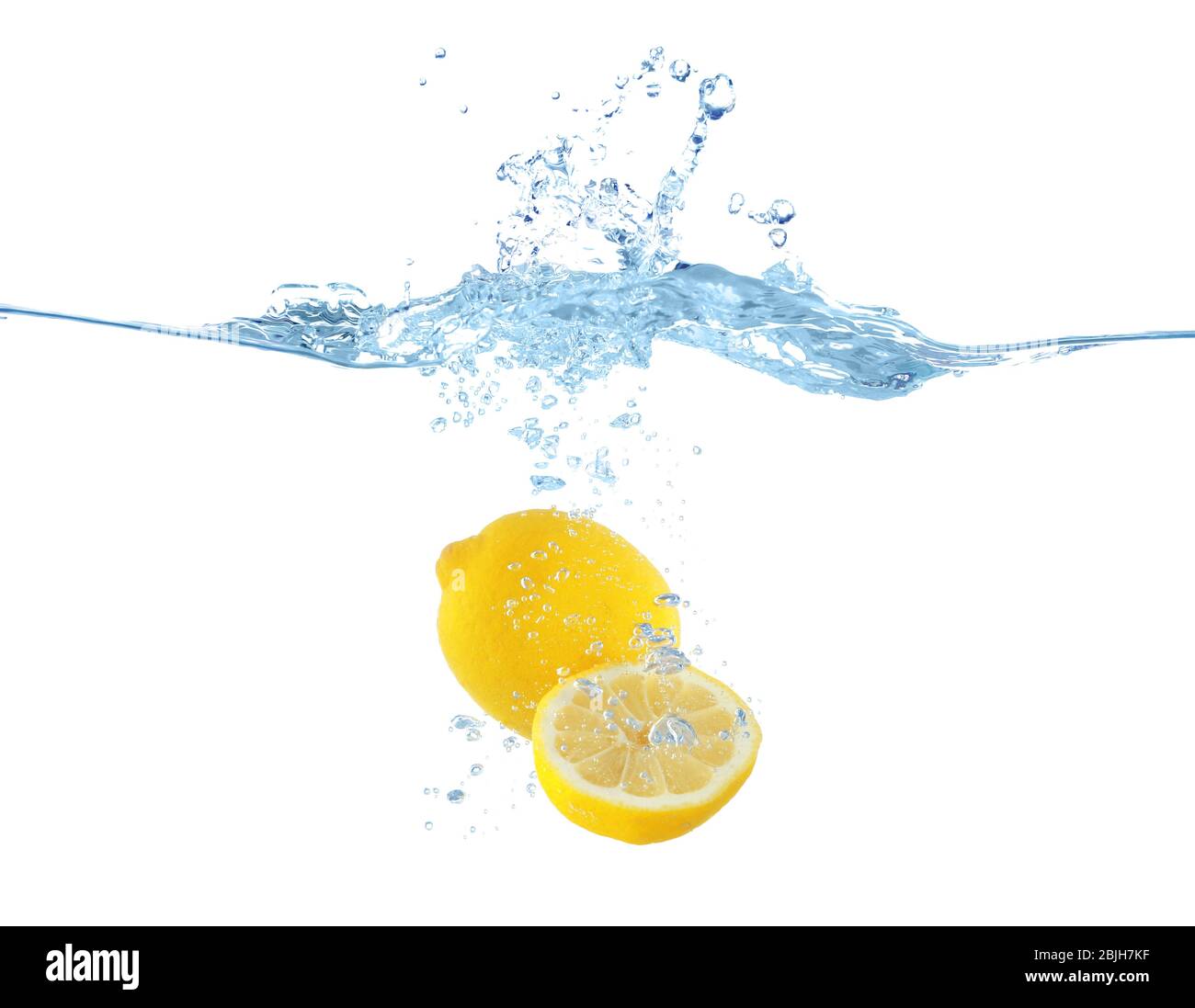 Sliced lemons falling water Cut Out Stock Images & Pictures - Alamy