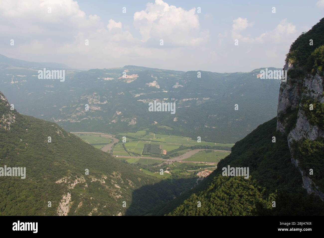 The view of mountain landscape with green slopes, valley, mountains and ...