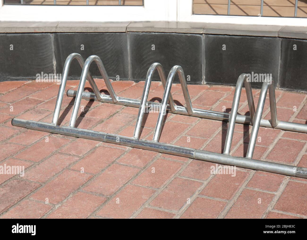 Empty bicycle racks, outdoor Stock Photo - Alamy
