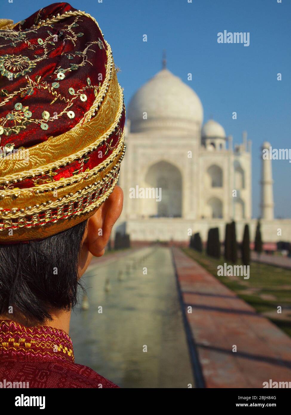 man watching the Taj mahal mausoleum in the city of agra in the uttar ...