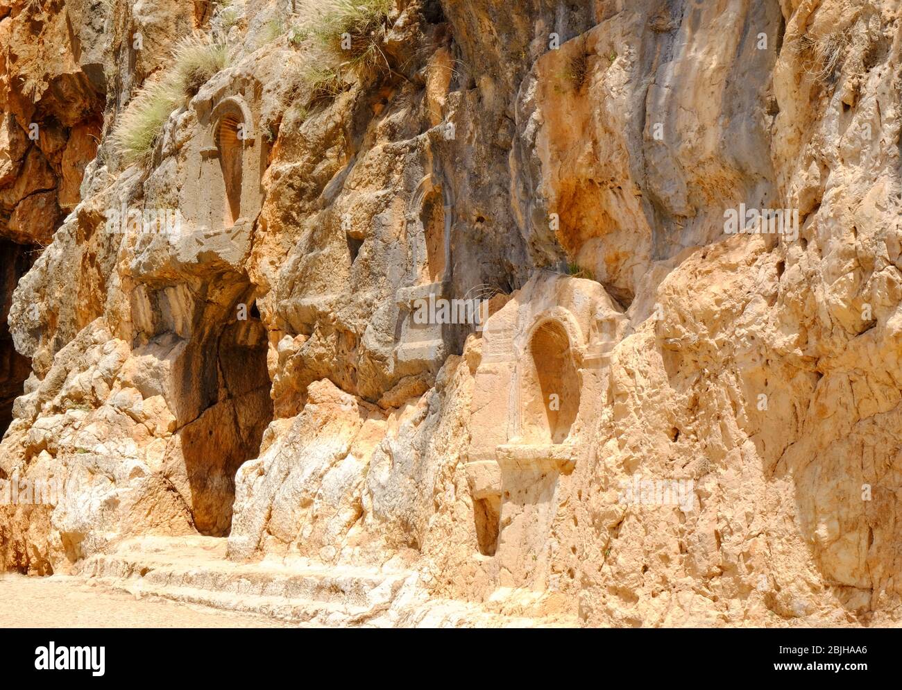 Rock with architectural elements of ancient civilization in old town ...