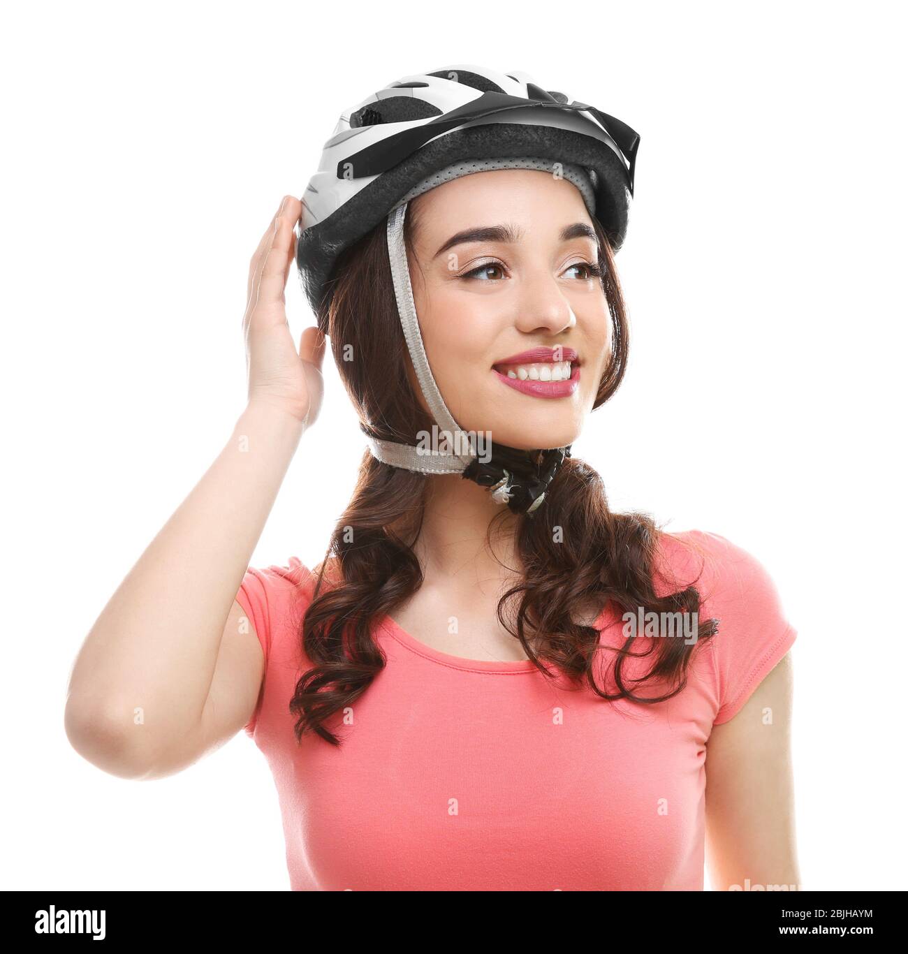 Beautiful young bicycle rider with helmet on white background Stock ...