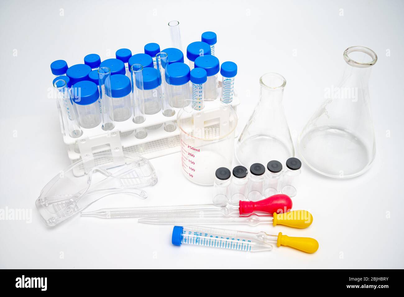 Any of the various tools and containers used in experiments on a white ...