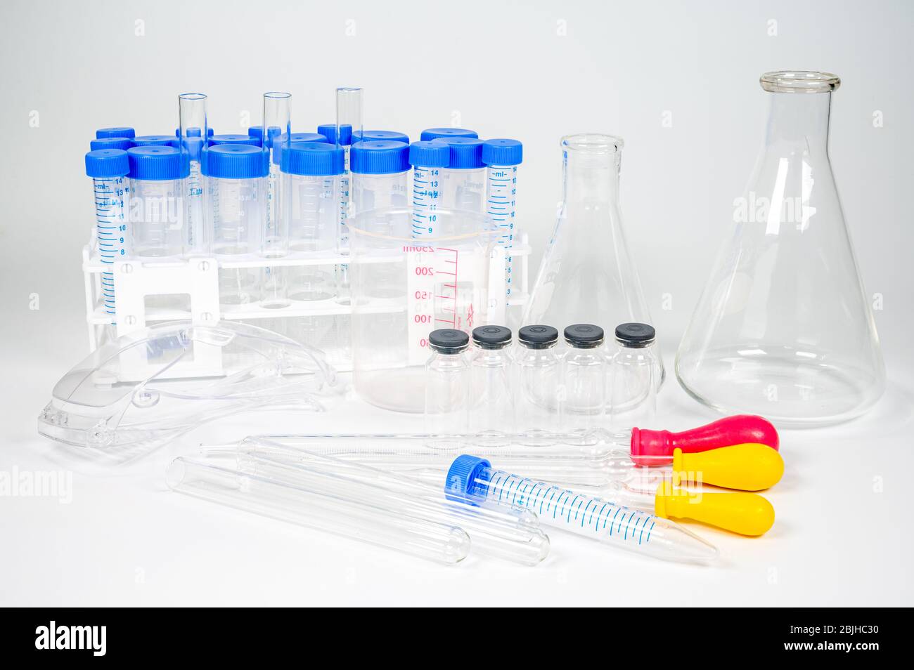 Any of the various tools and containers used in experiments on a white ...