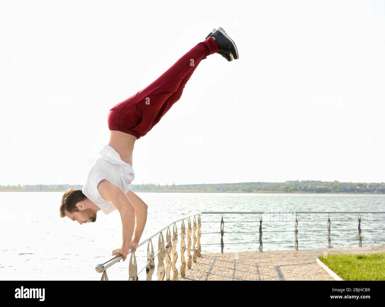 Caucasian man gymnastic acrobatics balance hi-res stock photography and ...