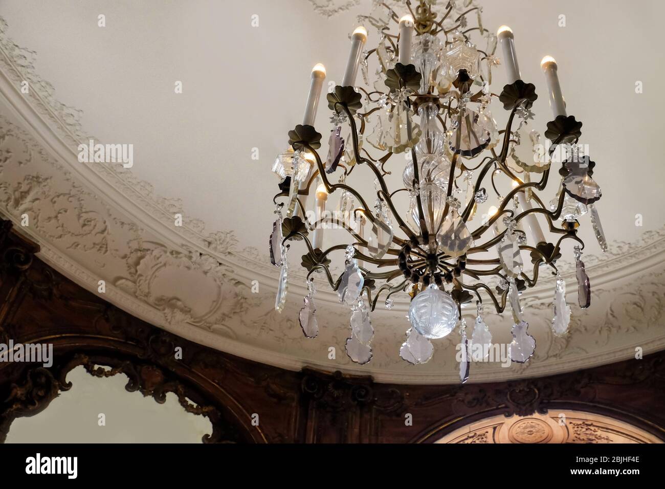 Ancient ceiling with beautiful chandelier and molding Stock Photo - Alamy
