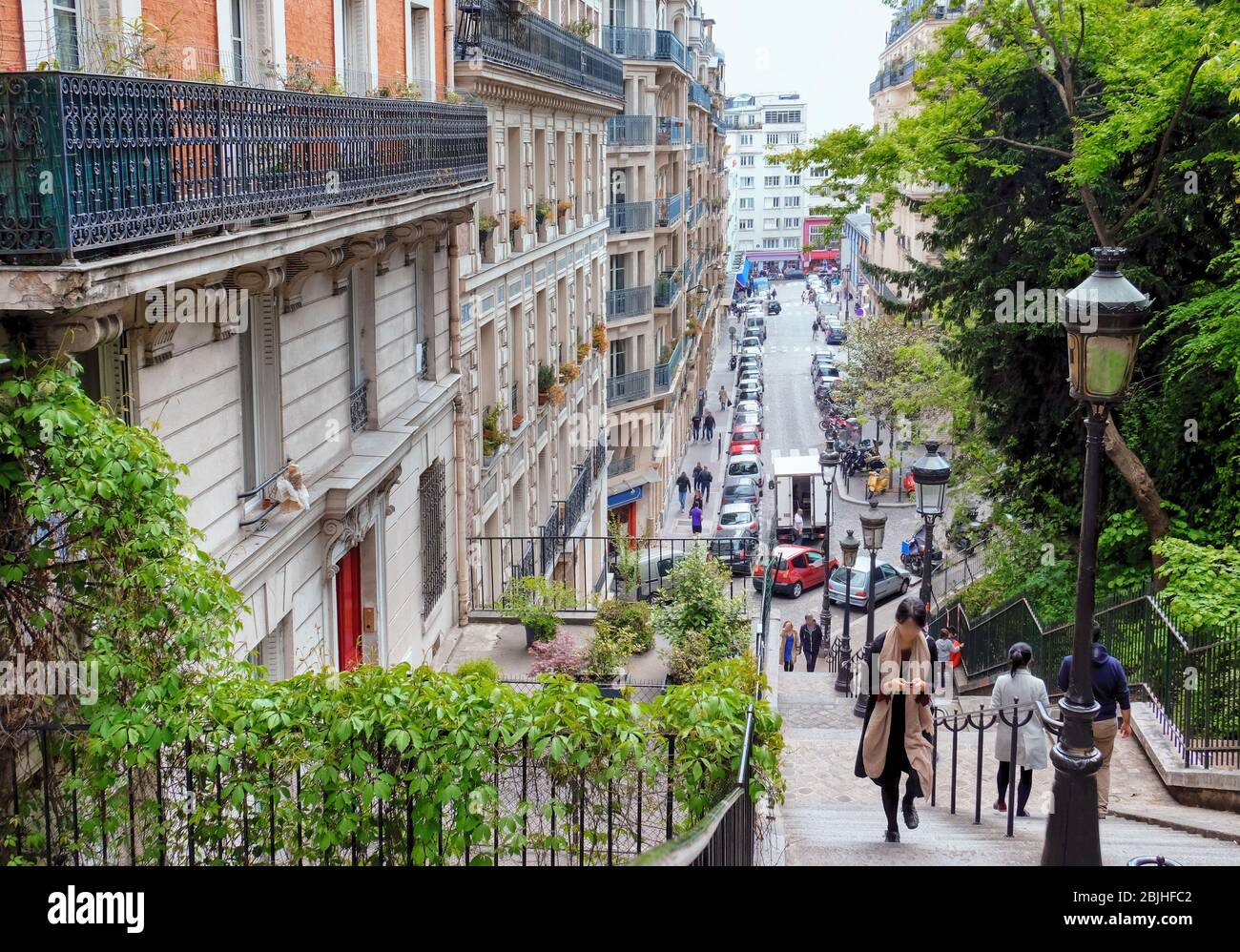 View of beautiful city street from stairs Stock Photo - Alamy
