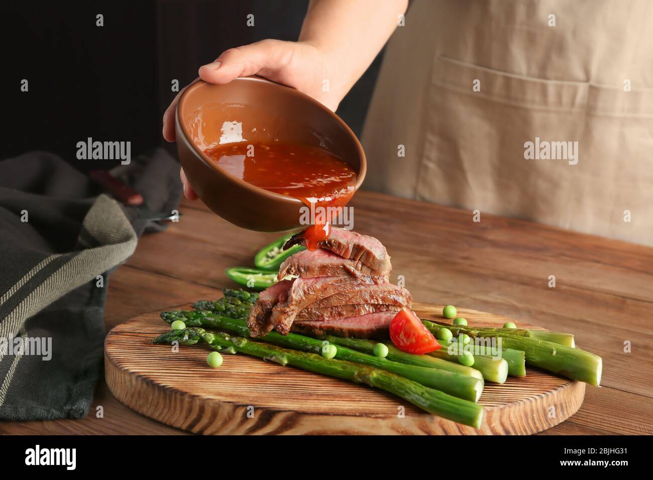Applying bbq sauce hi-res stock photography and images - Alamy