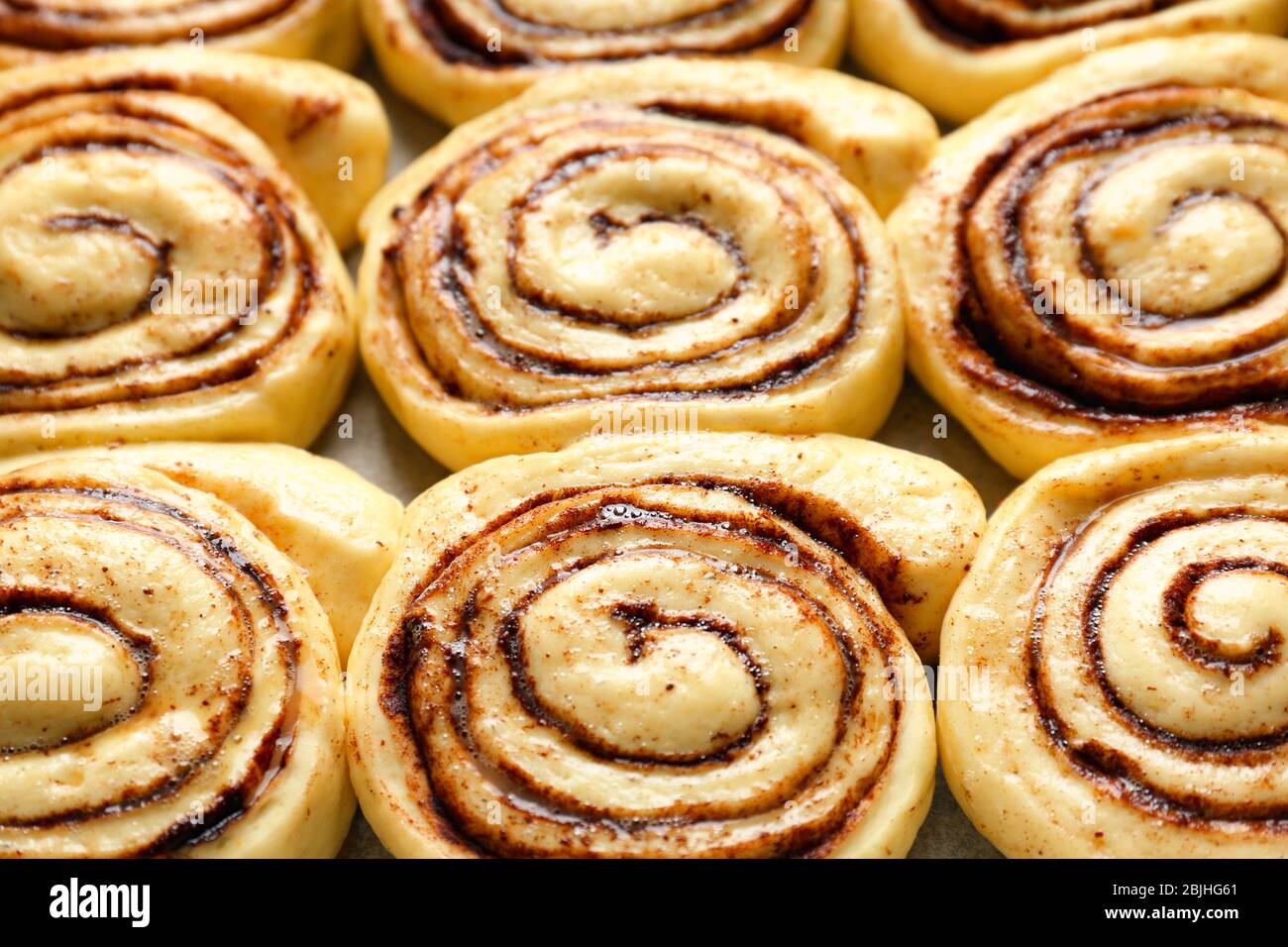 Raw cinnamon buns hi-res stock photography and images - Alamy