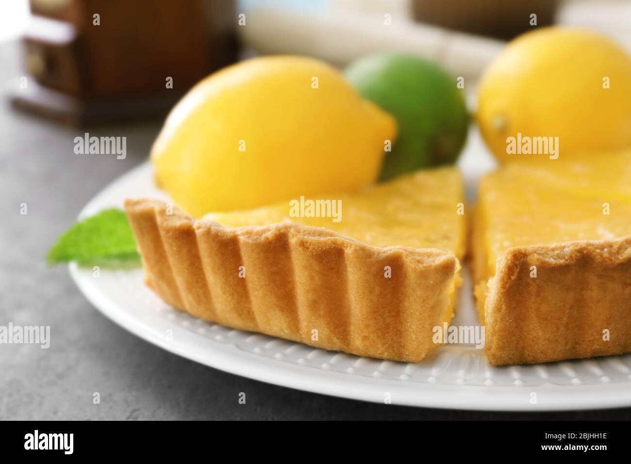 Pieces of homemade lemon tart on plate Stock Photo - Alamy