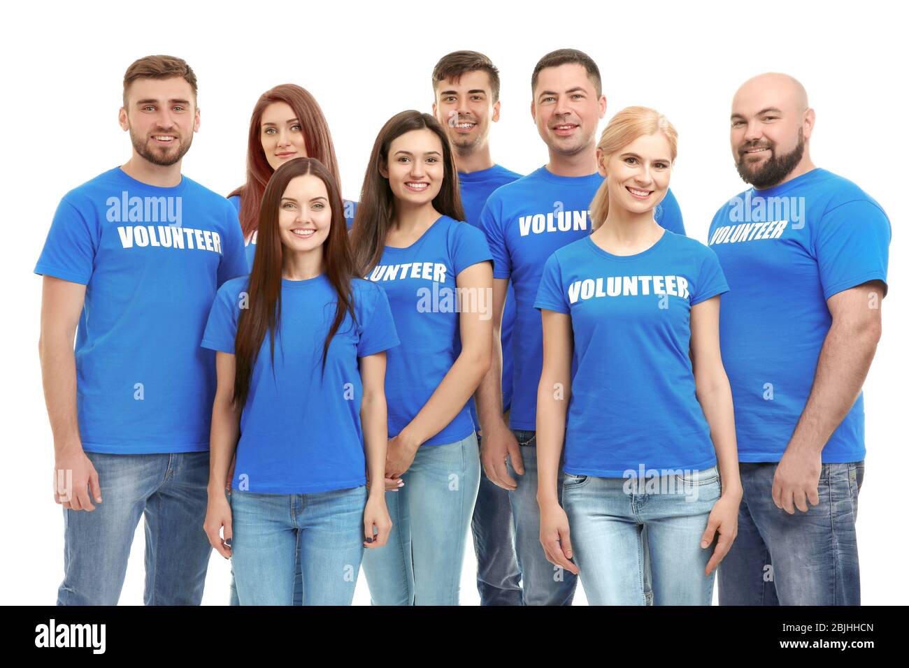 Group of young volunteers on white background Stock Photo - Alamy