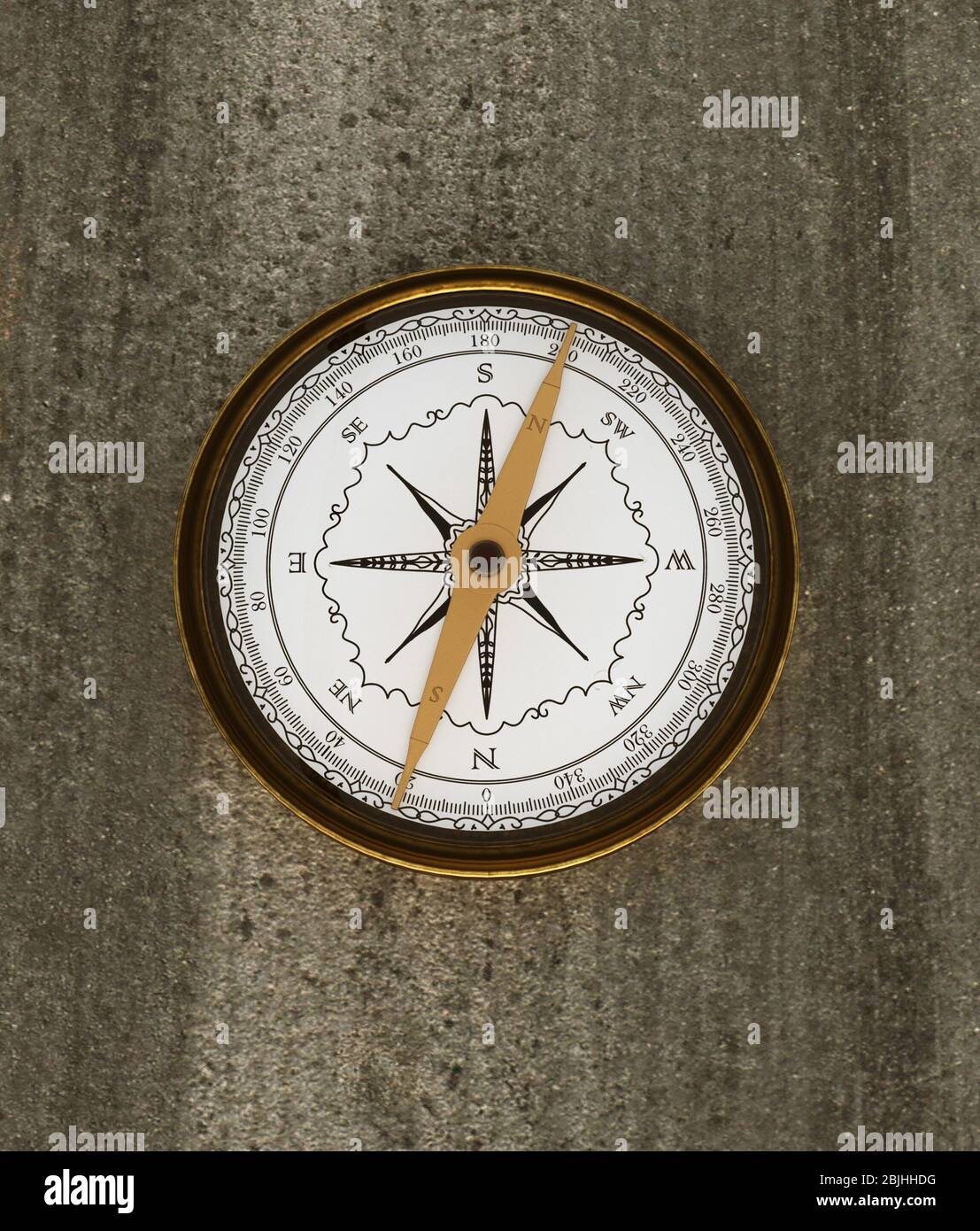 Vintage golden compass on the floor,3d rendering Stock Photo - Alamy