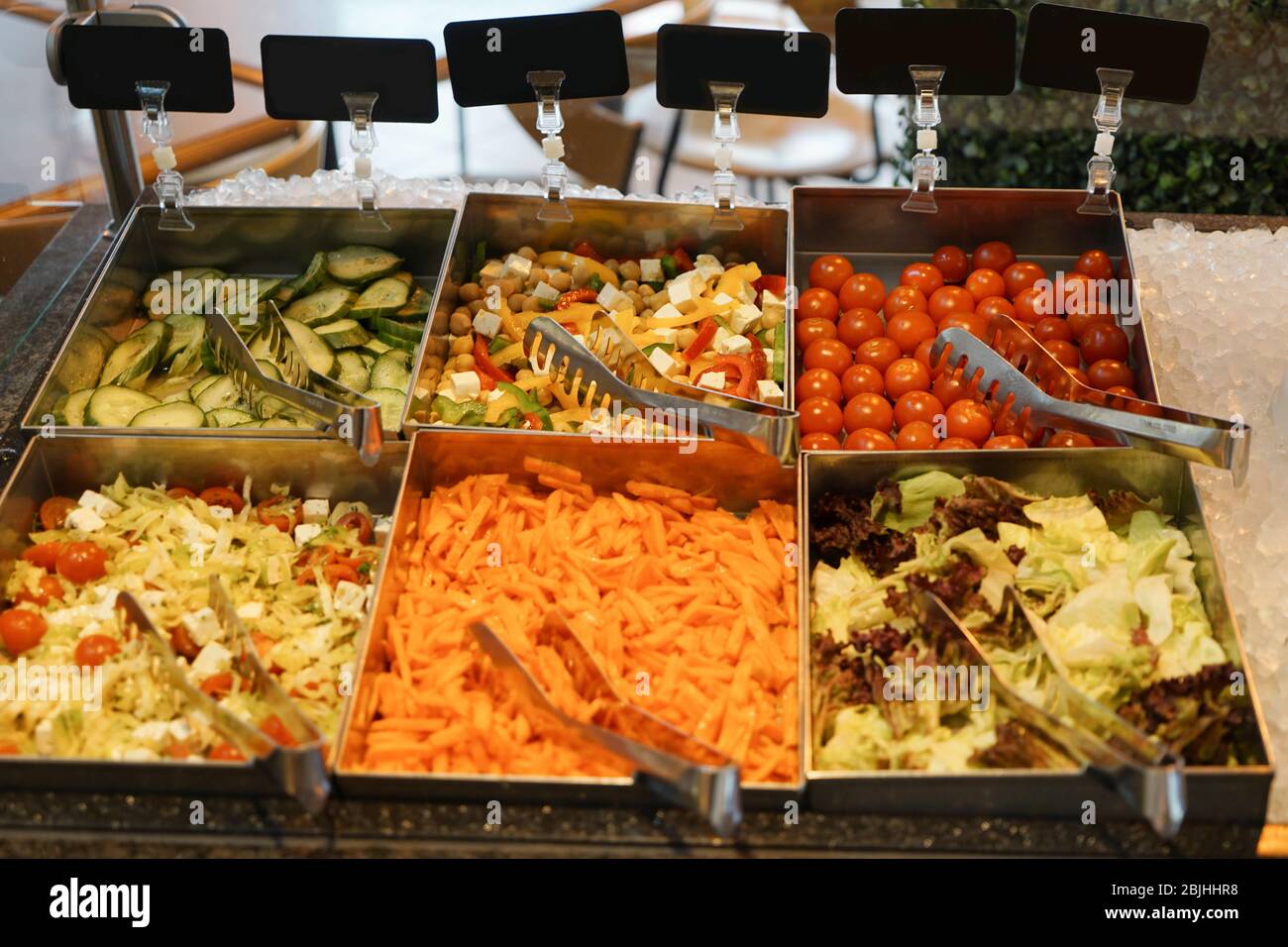 Stand with delicious food in cafeteria Stock Photo - Alamy