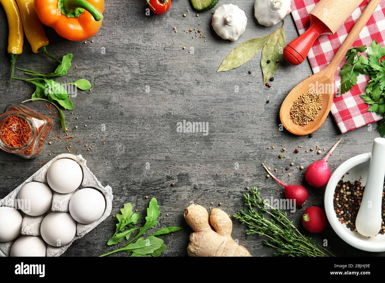 Vegetables and spices on kitchen table. Cooking classes concept Stock ...