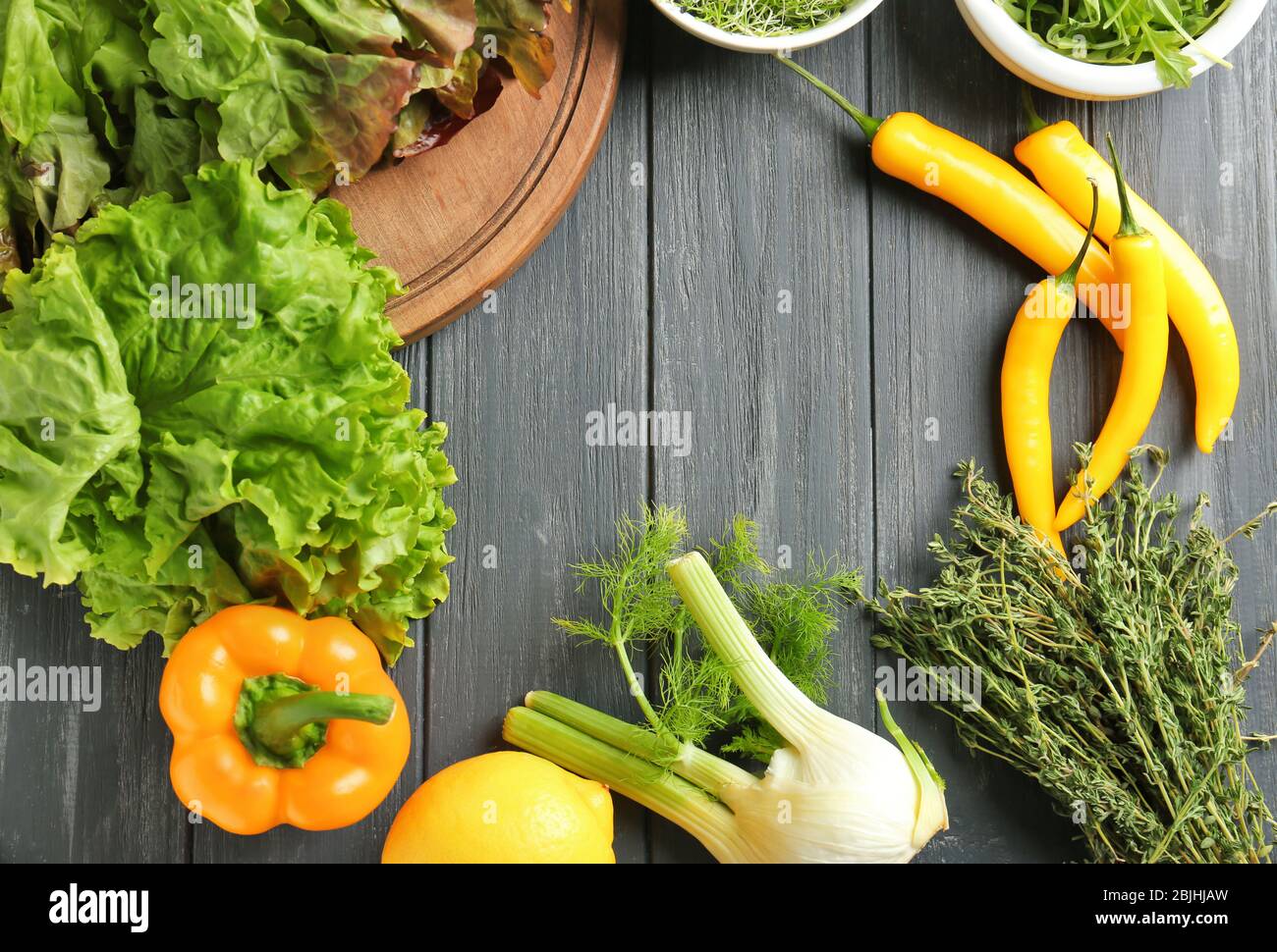 Vegetables on kitchen table. Cooking classes concept Stock Photo - Alamy