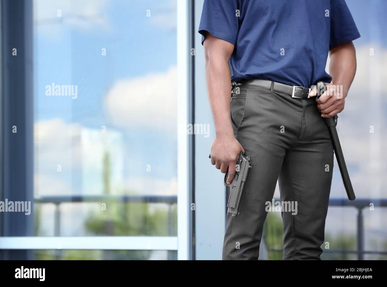 Security guard with gun hi-res stock photography and images - Alamy