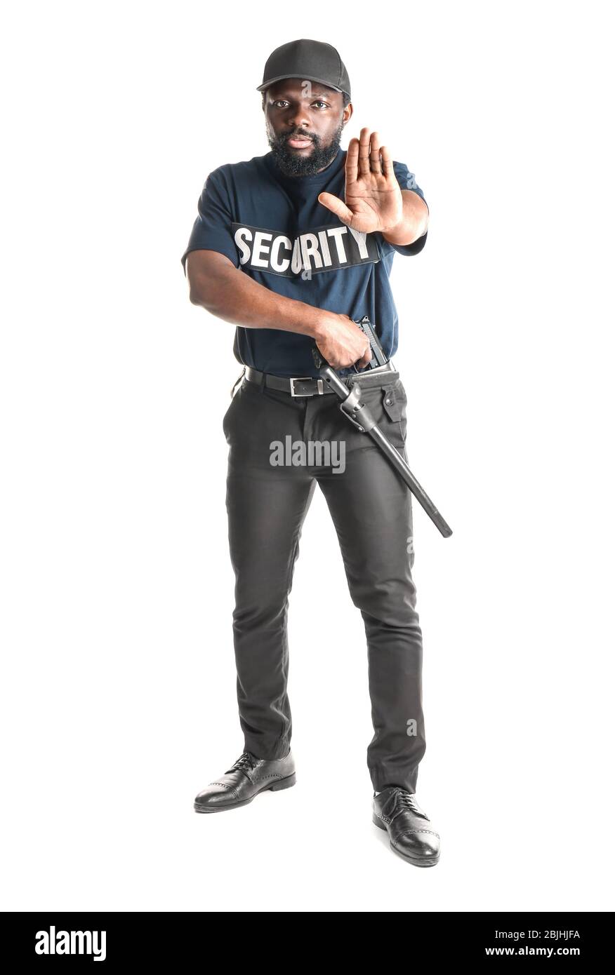 Male security guard showing stop gesture on white background Stock ...
