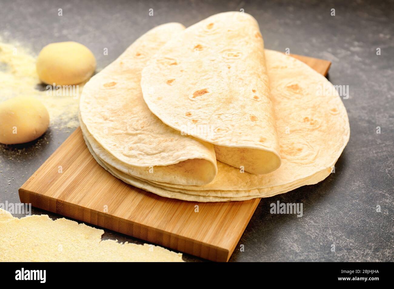 Delicious tortillas on kitchen table Stock Photo - Alamy