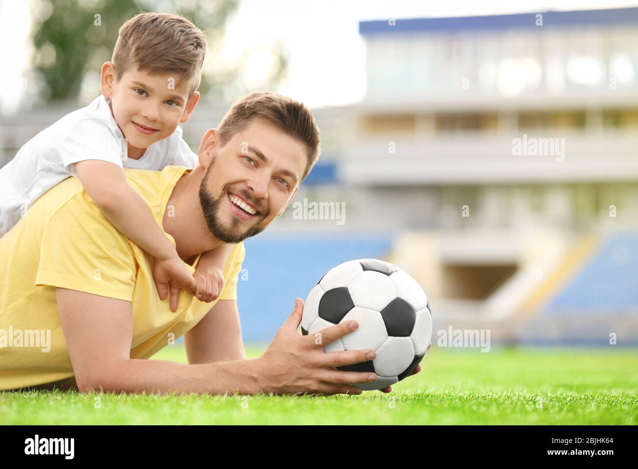 Kid dad stadium hi-res stock photography and images - Alamy