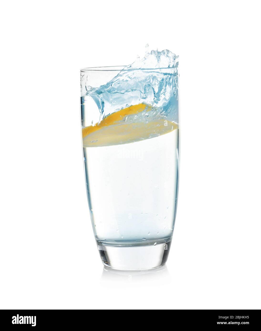 Glass of lemonade with splashing water on white background Stock Photo ...