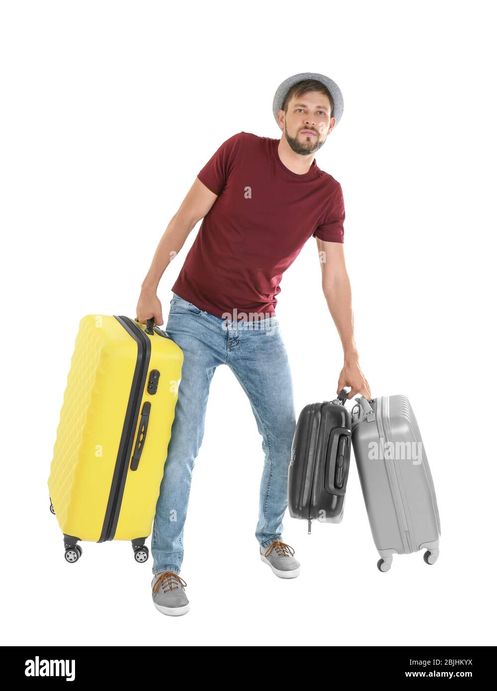 Man with overweight luggage, isolated on white Stock Photo - Alamy