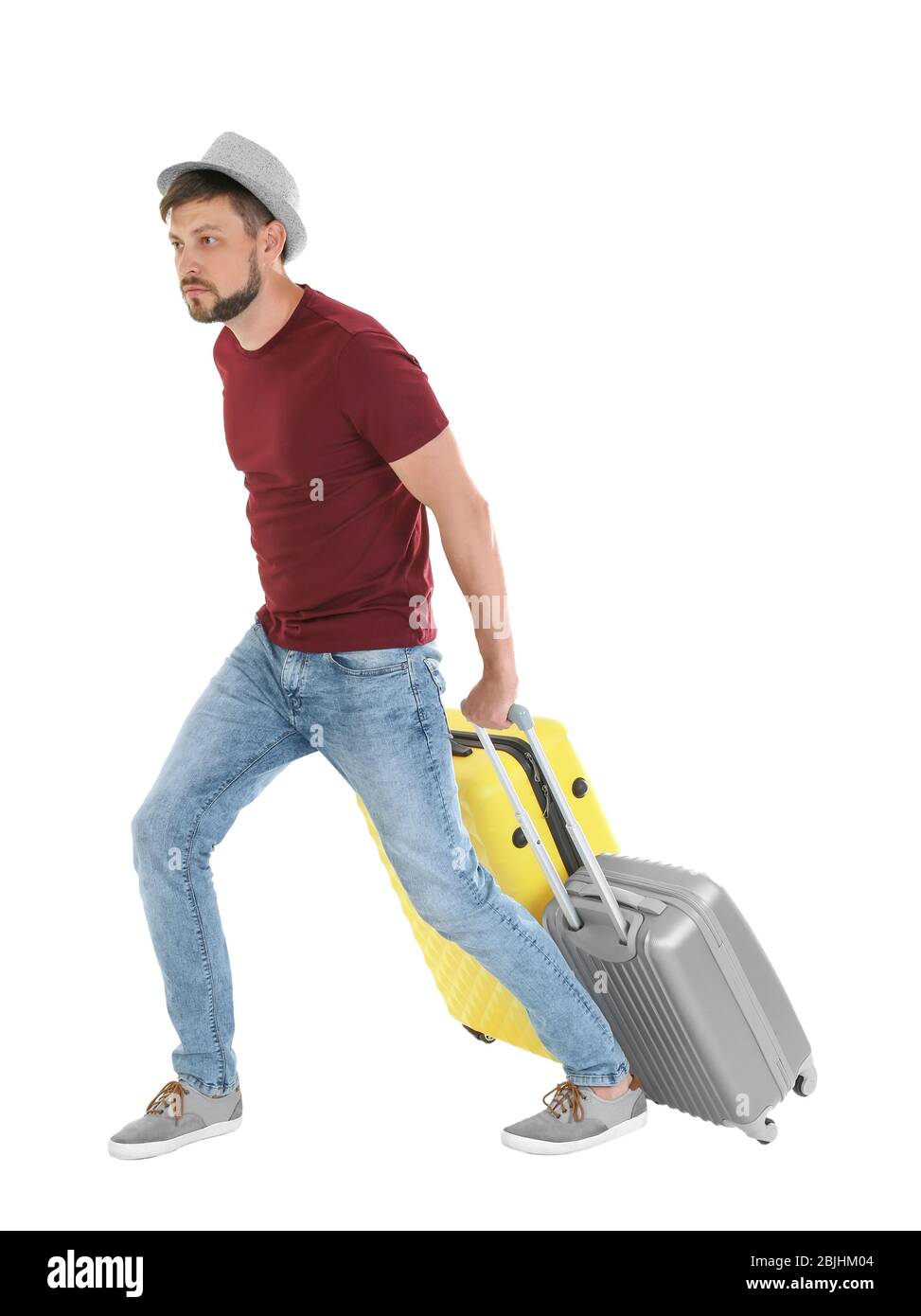 Man with overweight luggage, isolated on white Stock Photo - Alamy