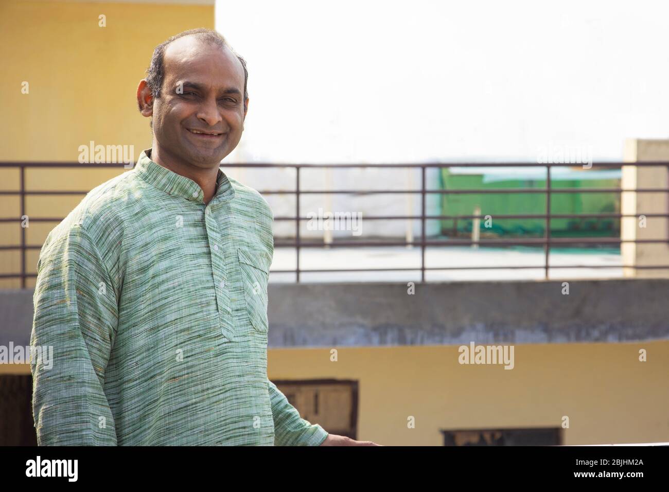 Portrait Of Indian Man Smiling Stock Photo - Alamy