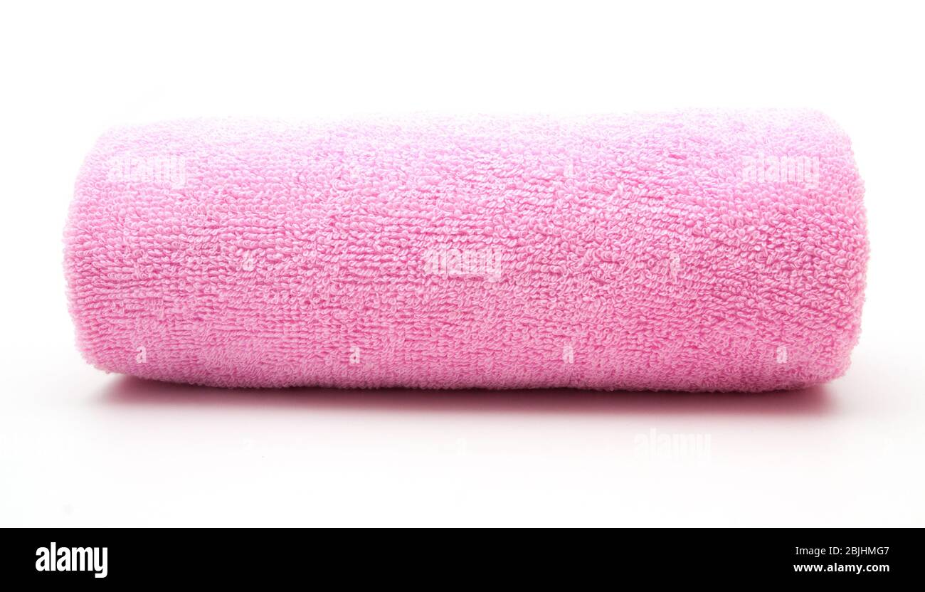 Pink pile of rainbow colored towels isolated Stock Photo - Alamy
