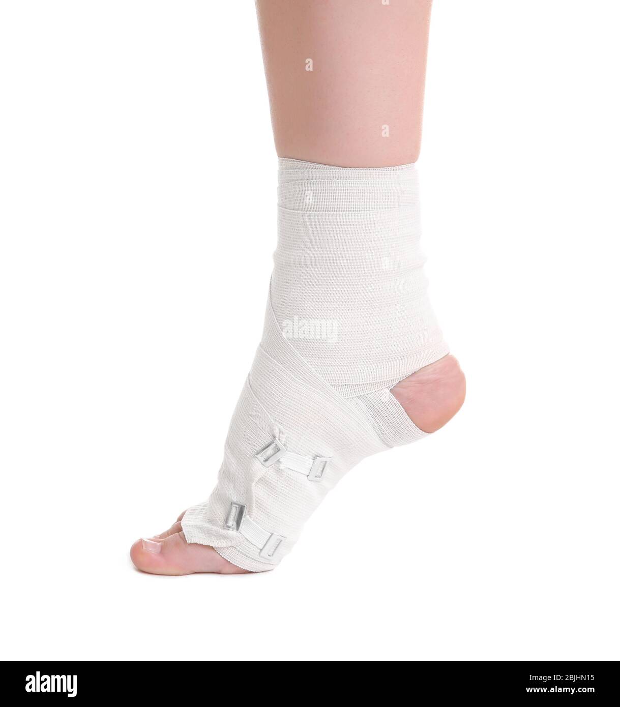 Bandaged leg of young woman on white background Stock Photo - Alamy