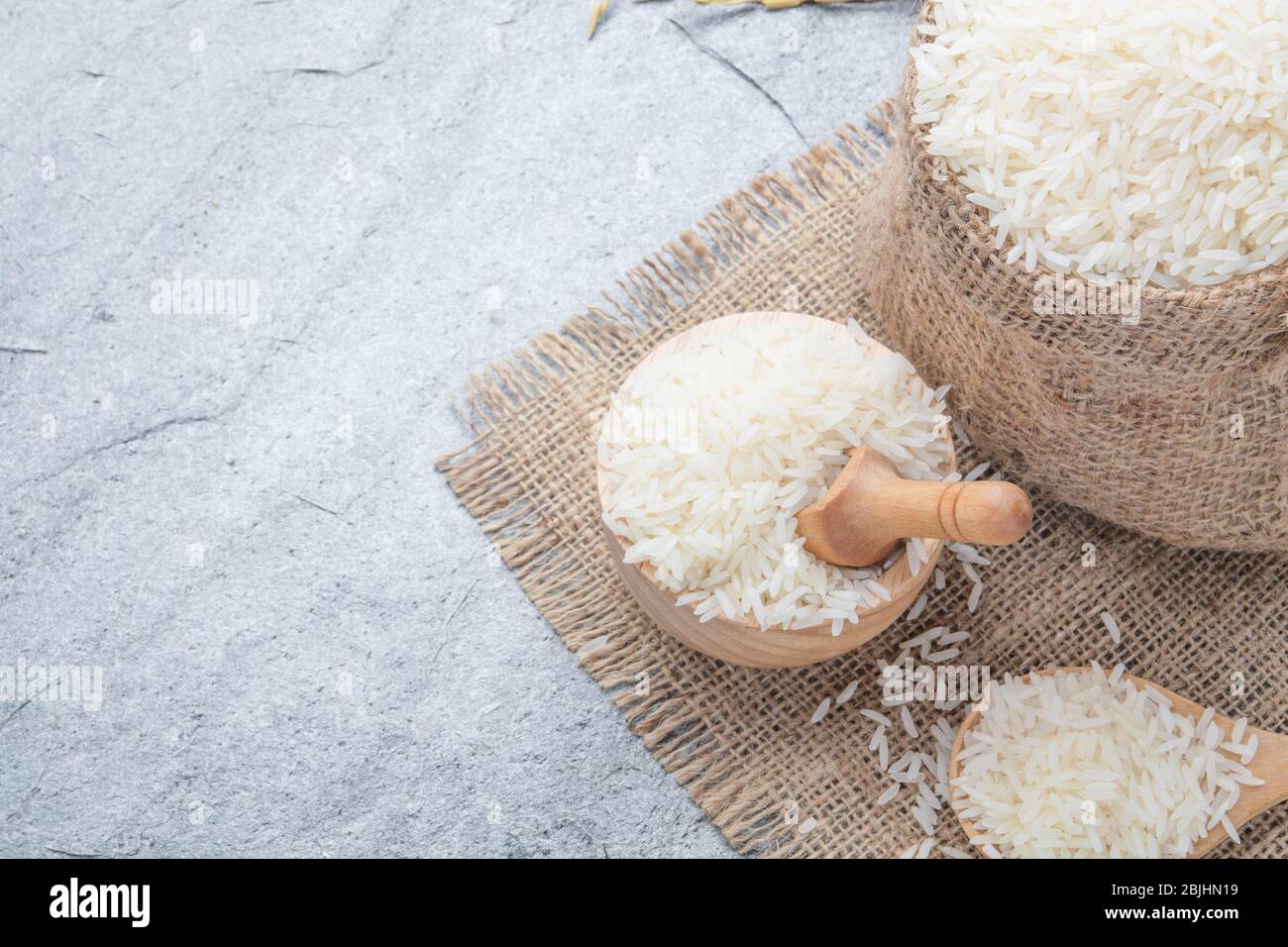 thai fragrant jasmine rice in a bowl with gold spike on Sack Stock ...