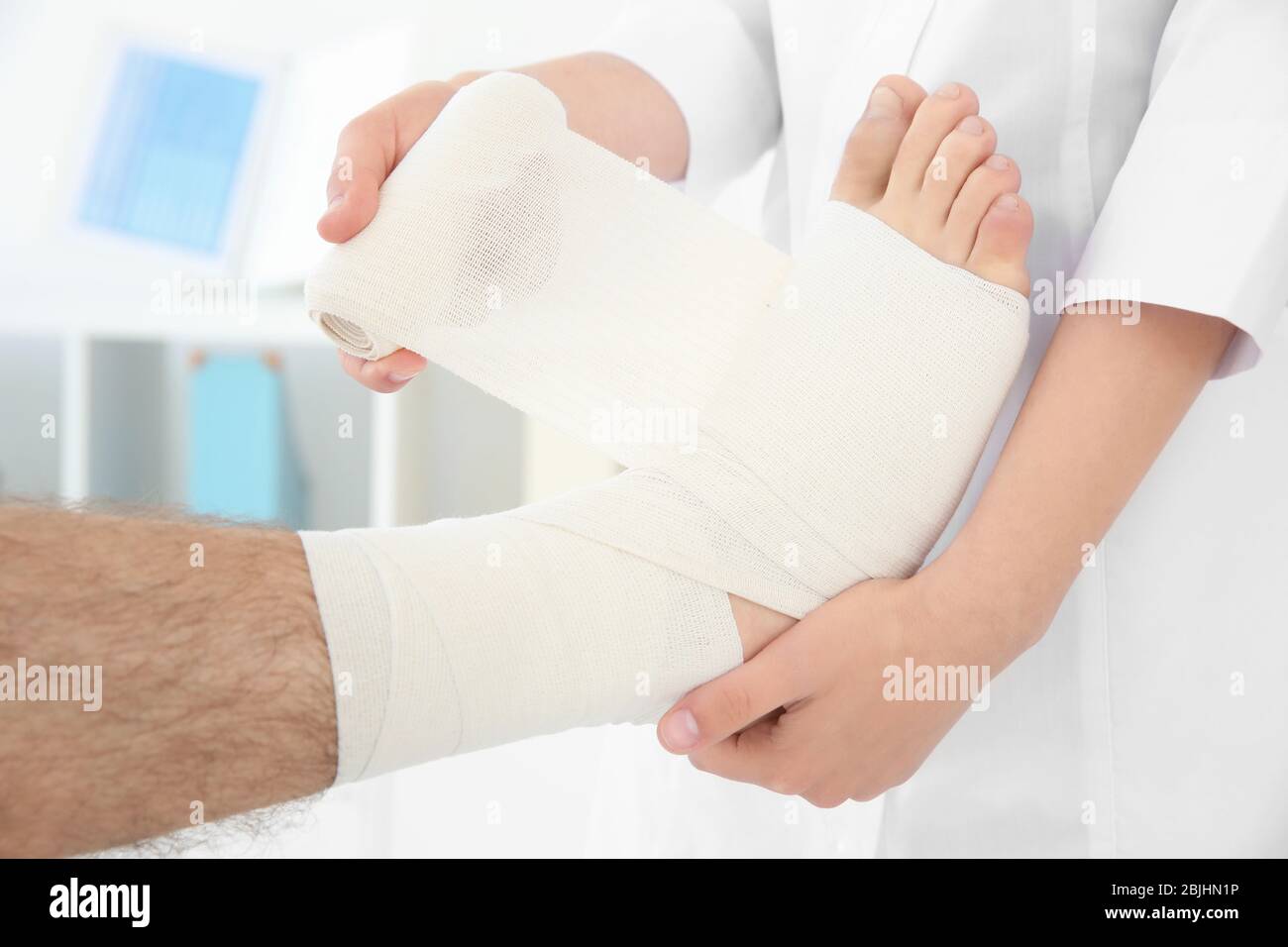 Applying elastic bandage ankle hi-res stock photography and images - Alamy