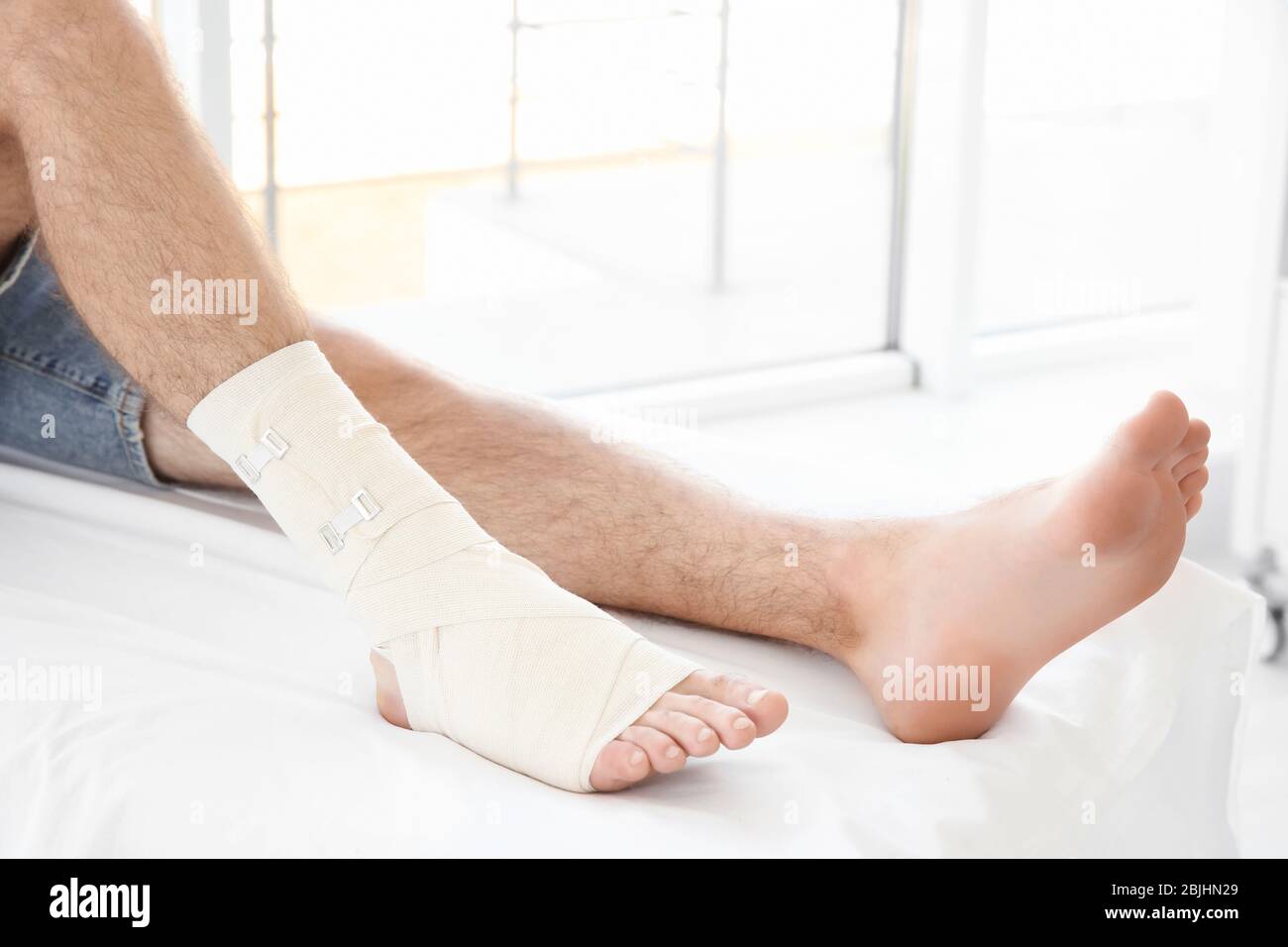 Bandaged leg hi-res stock photography and images - Alamy