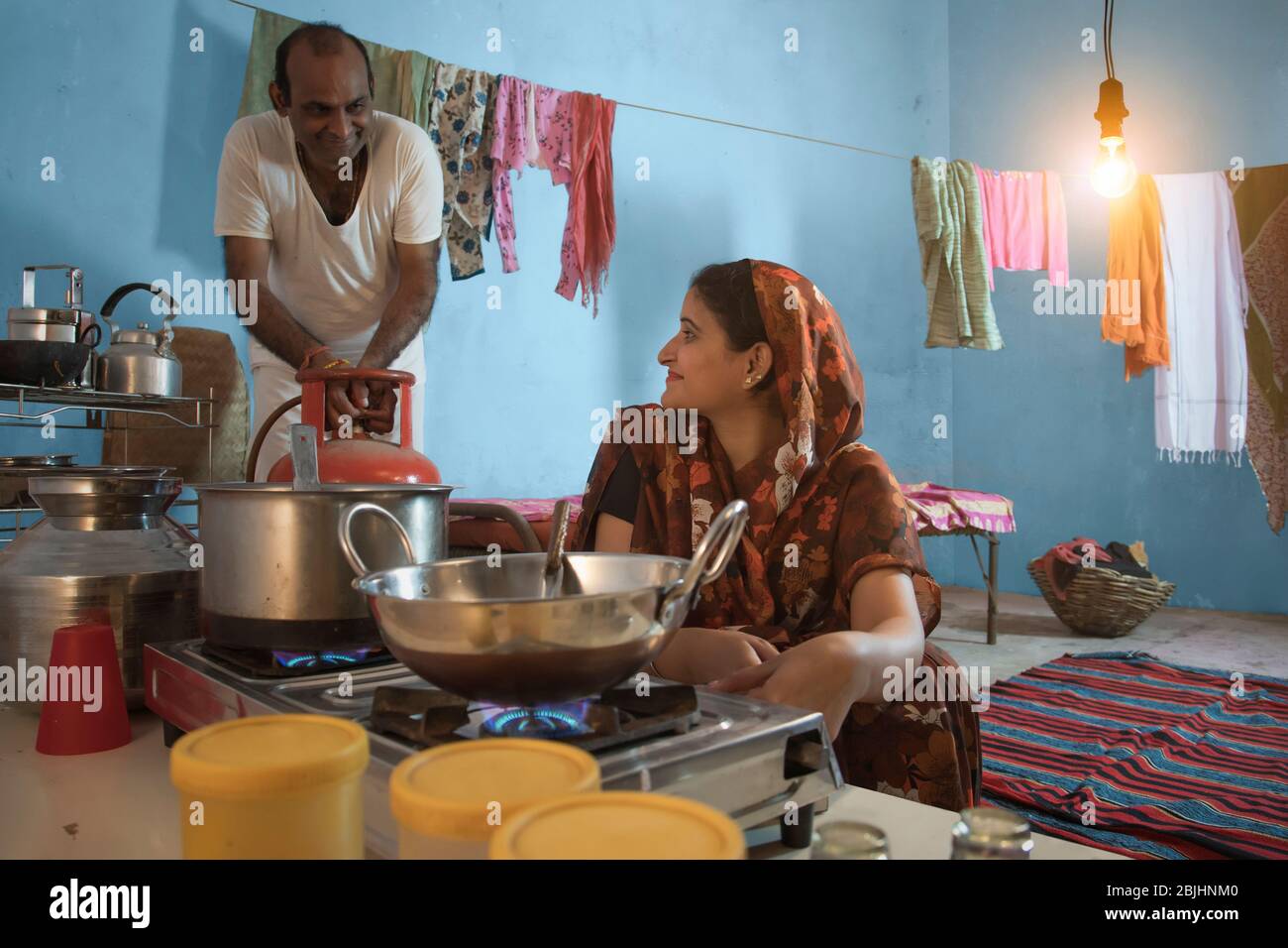 Woman cooking other kitchen hi-res stock photography and images - Alamy