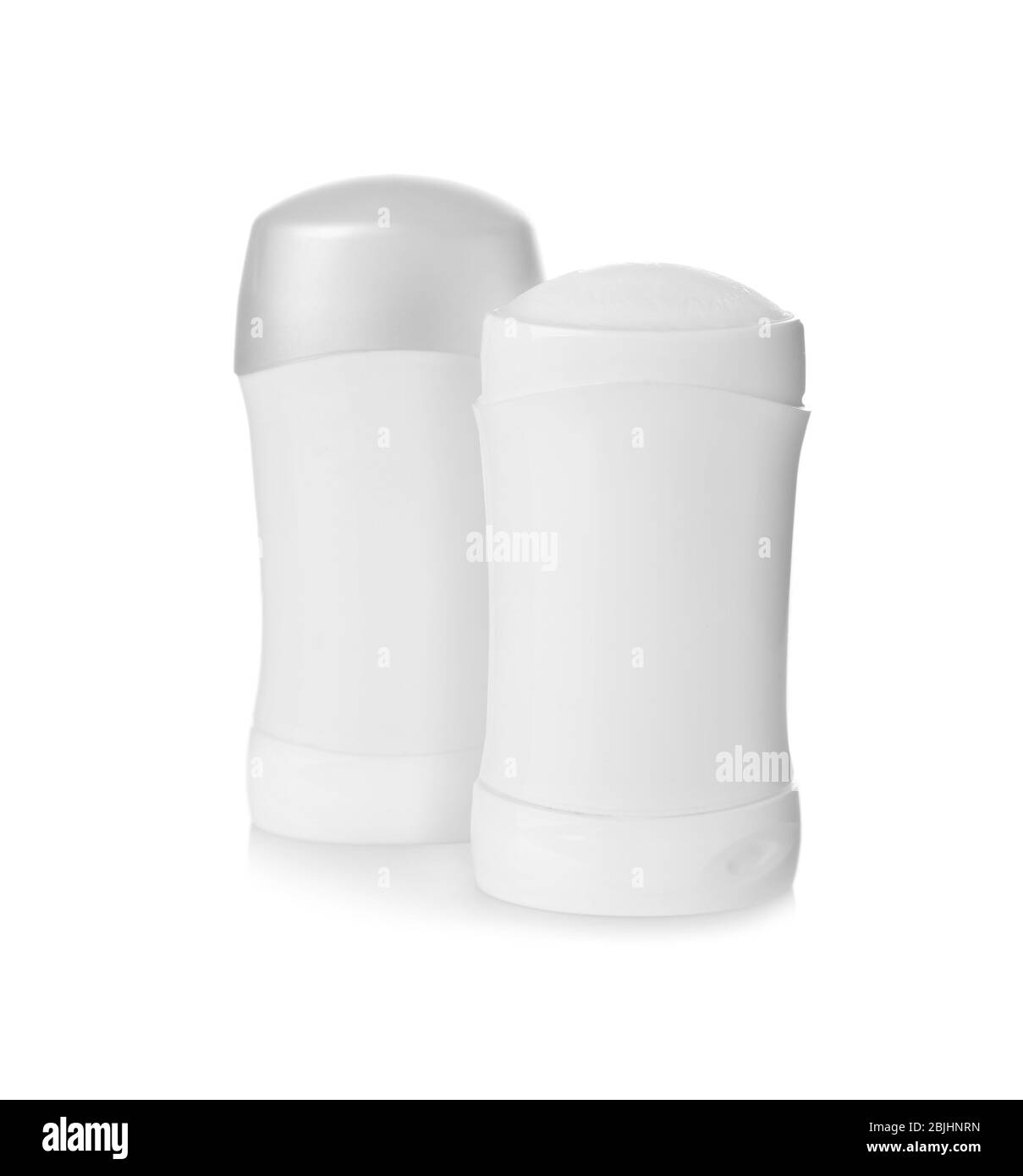 Female deodorants on white background Stock Photo - Alamy