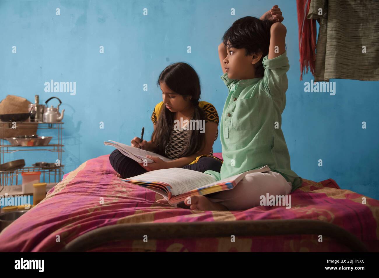 Rural kids Studying At Night Stock Photo - Alamy