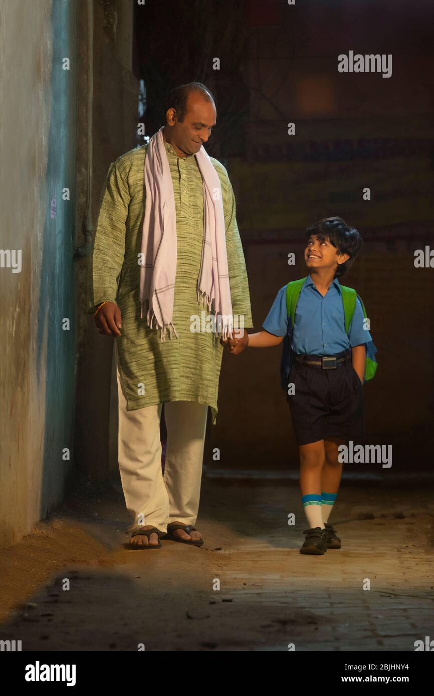 A Father Picks His Child From School Stock Photo - Alamy