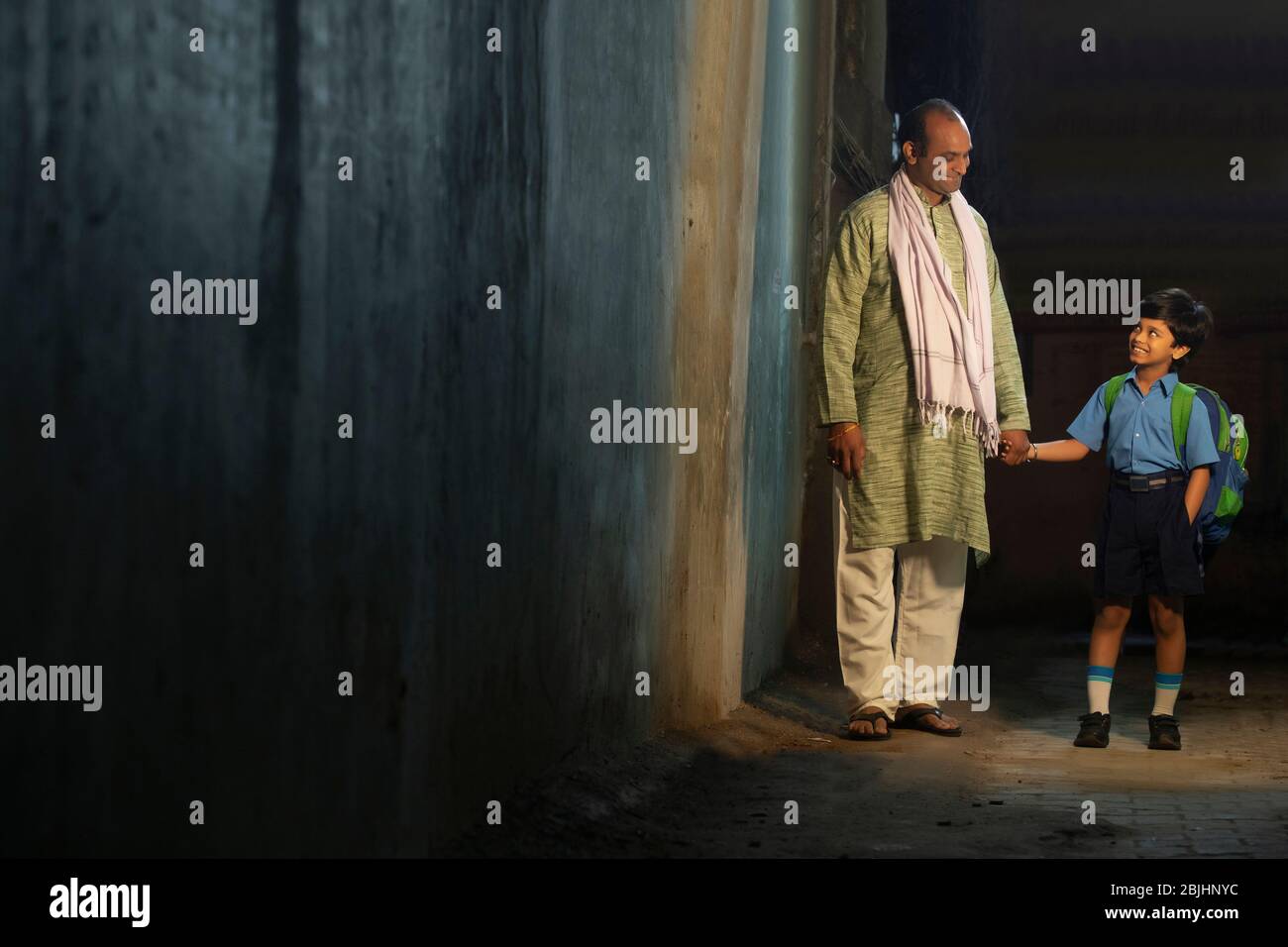 A Father Picks His Child From School Stock Photo - Alamy