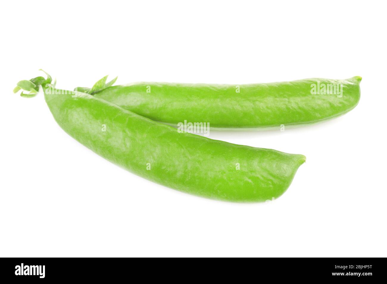Fresh green peas pods on white background Stock Photo - Alamy